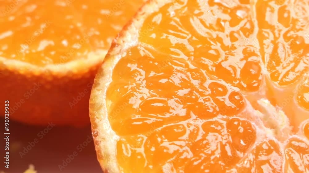 Texture of a cut mandarin orange close-up. Packing grid in the frame ...