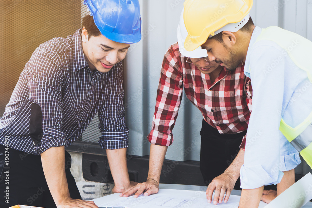 Concept Teamwork of building construction staff. Project engineer ...