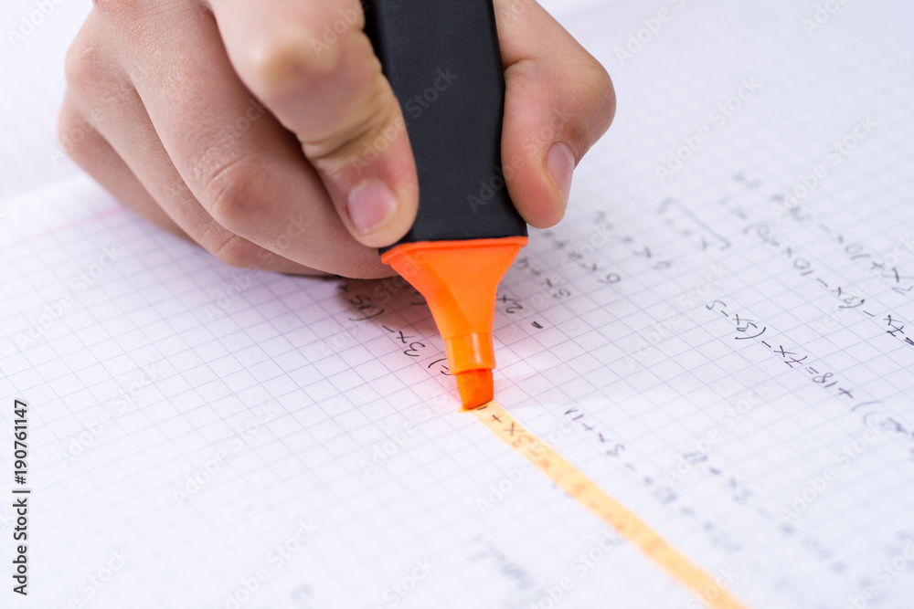 Highlighter in Childrens Hand Marked Text in Notebook. School Concept ...