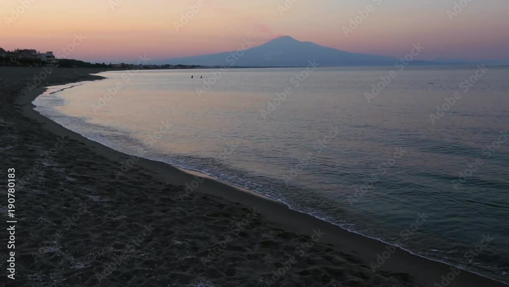 Beautiful sunset twilight on Agnone Bagni sea beach with smoky Etna ...