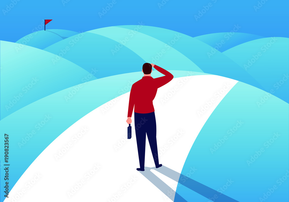 Businessman standing in the mountains watching the distance Stock ...