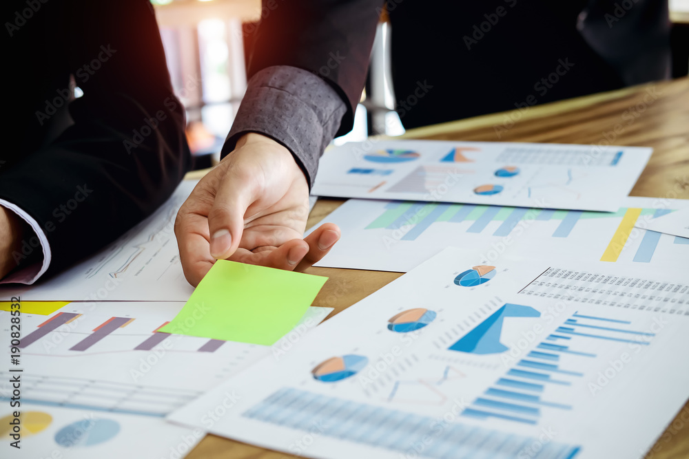 Business man hand holding note paper meeting working with new startup ...