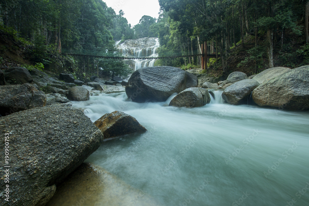 The scenery in the waterfall area in the tropical rainforest in Kuantan ...