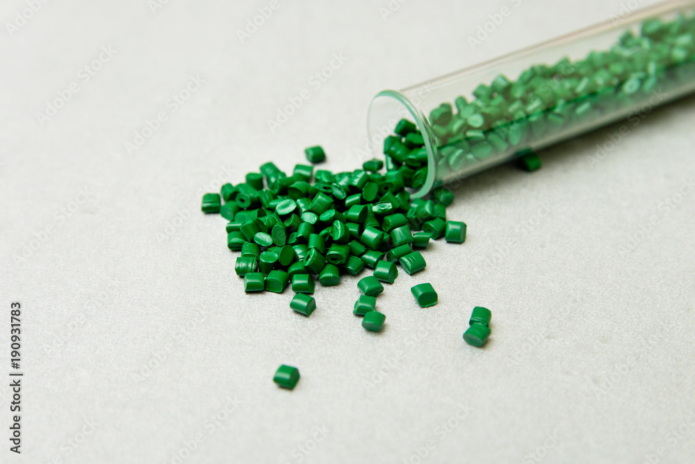 Plastic pallets . Plastic raw materials in granules for industry.Green ...