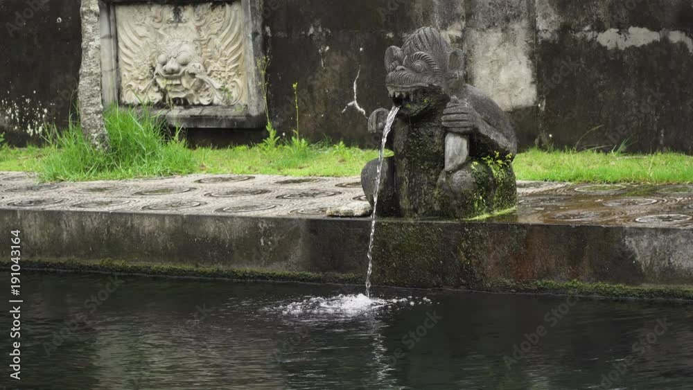 Hindu Balinese Water Palace Tirta Gangga with statues of the gods ...