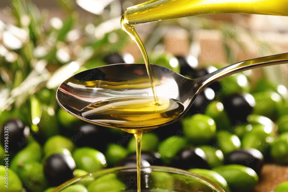 Genuine Italian olives organic oil cold pressed falls. concept of ...