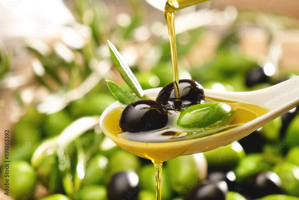 Genuine Italian olives organic oil cold pressed falls. concept of ...