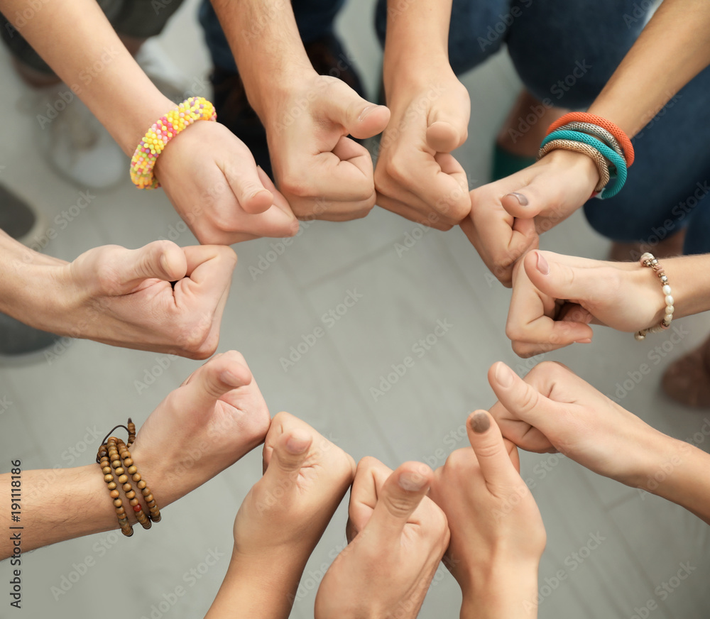 People putting hands together as symbol of unity Stock Photo | Adobe Stock