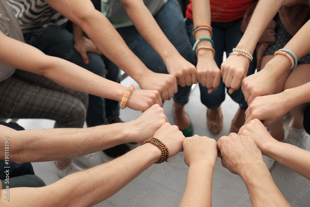 People putting hands together as symbol of unity Stock Photo | Adobe Stock