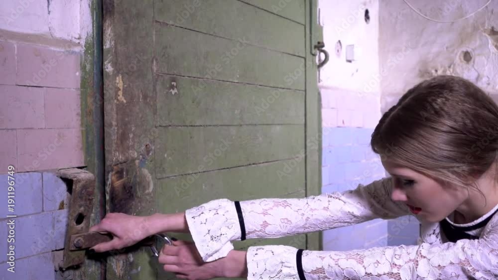 Frightened woman locked herself in the basement trying to open the lock ...