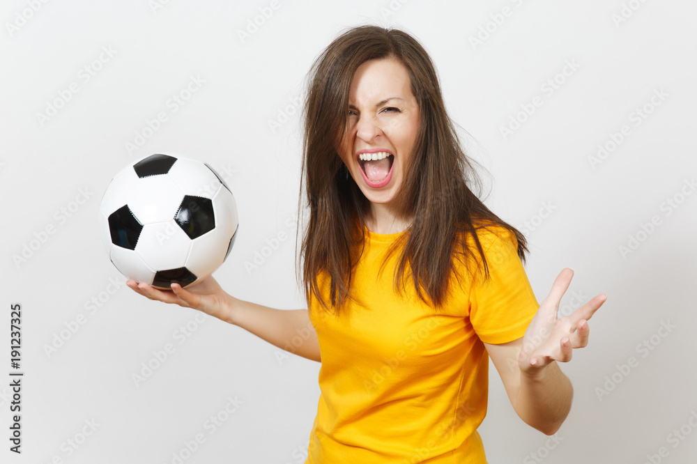 Beautiful European young angry screaming woman, football fan or player ...