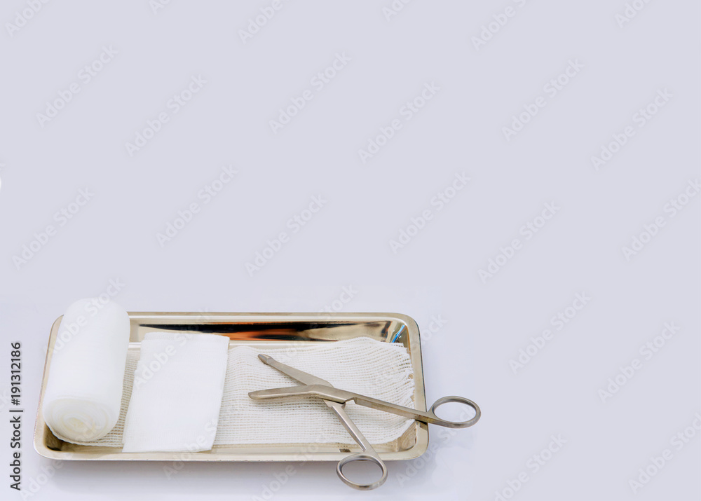 dressing wound set ,scissors ,roll gauze ,pad gauze,tray on white ...