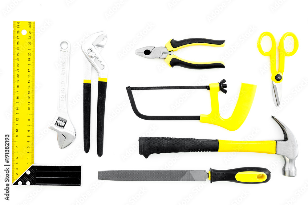 Repair tool kit. File, saw, hummer, corner ruler on white background ...