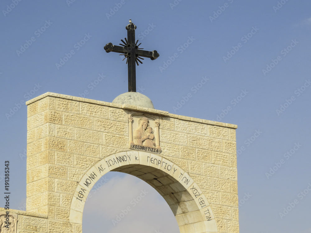Jericho, Israel - entrance door with the cross to the view area of the ...