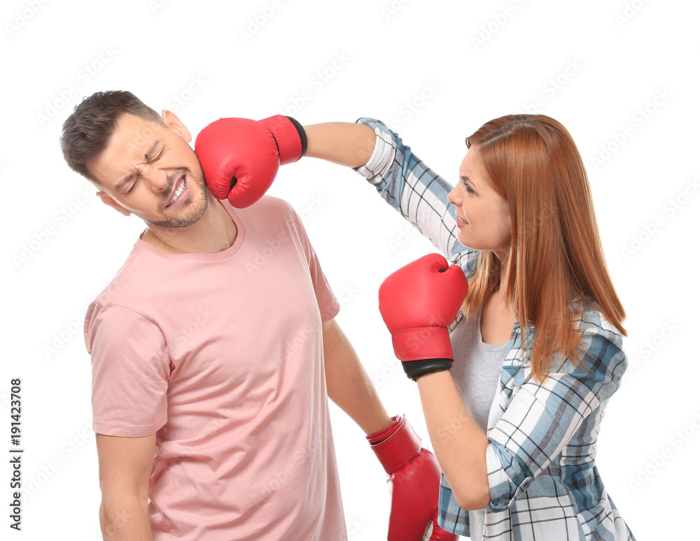 Angry couple in boxing gloves fighting on white background Stock Photo ...