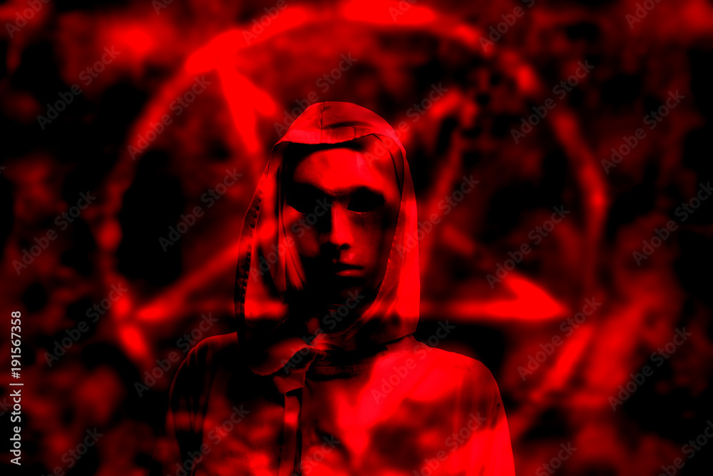 satanic priest in red background Stock Photo | Adobe Stock