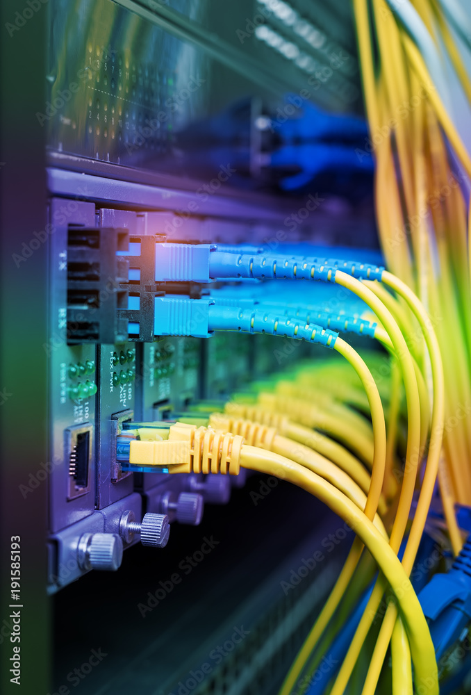 Fiber Optic cables connected to optic ports and UTP, Network cables ...