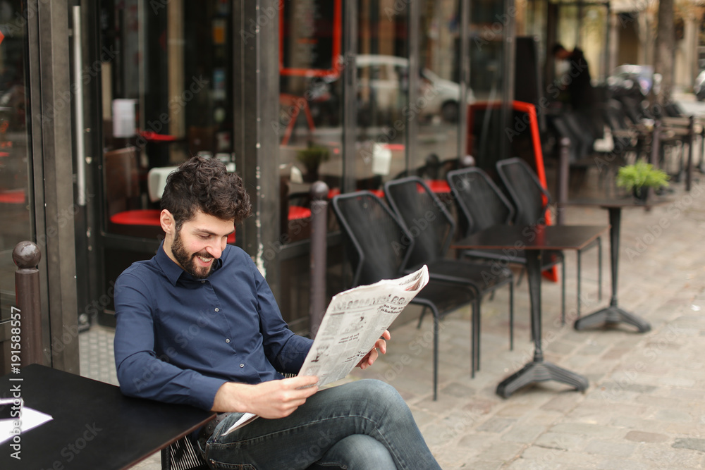 journalist enjoying with reading newspaper columns and articles with ...