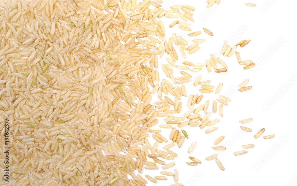 Integral, long grain brown rice pile isolated on white background, top ...