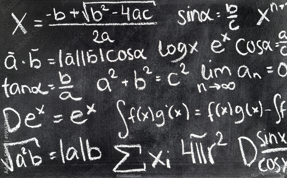 Handwritten mathematical formulas on blackboard written with chalk ...