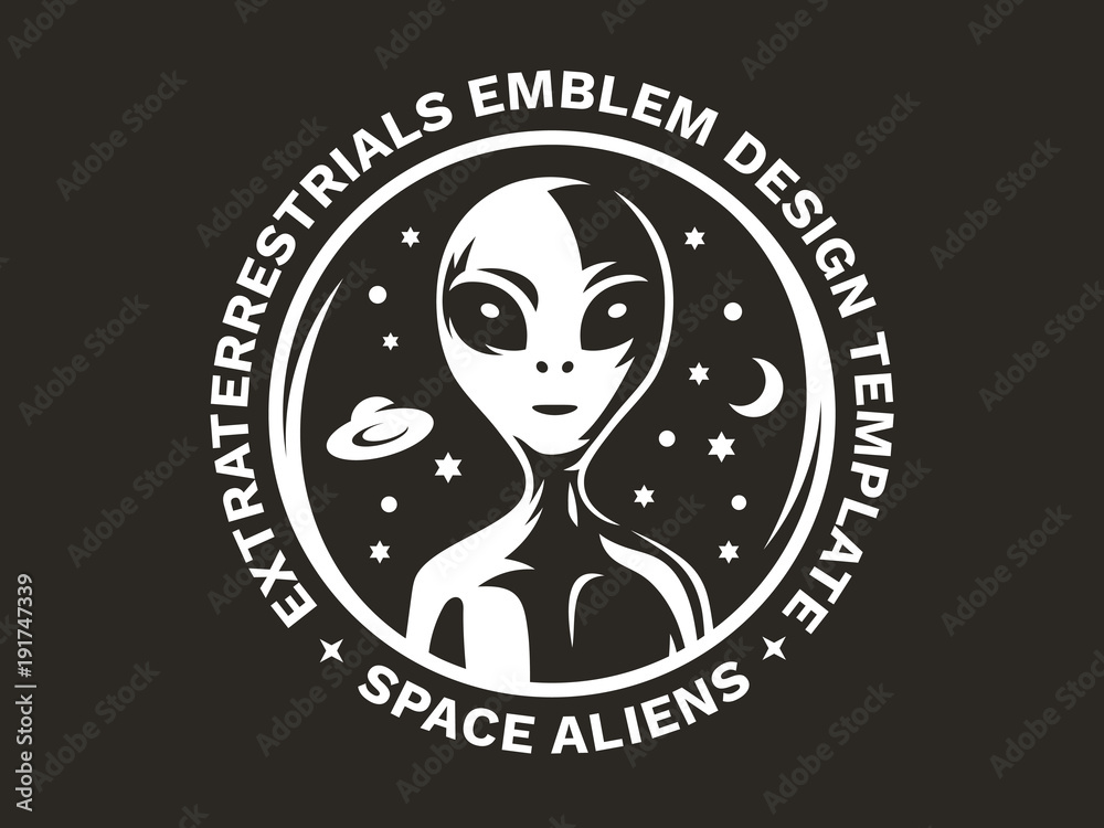 The figure of an alien on the chest in a circle against the background ...