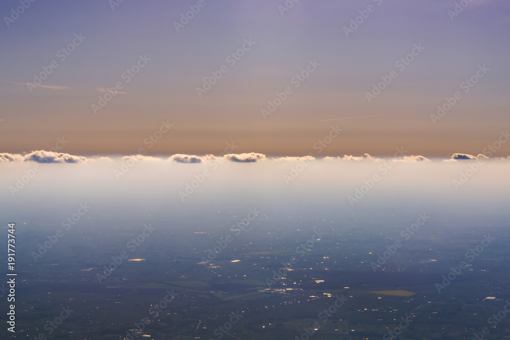 Horizon line with clouds senn from plane window Stock Photo | Adobe Stock
