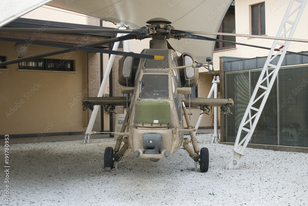 fuselage of a military helicopter used in war, metal, camouflage, with ...