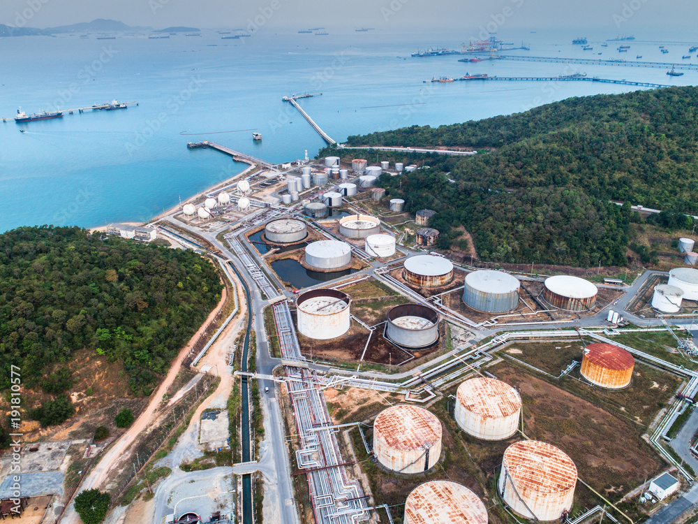 aerial view of oil refinery plants with tanks storage locate in sea ...
