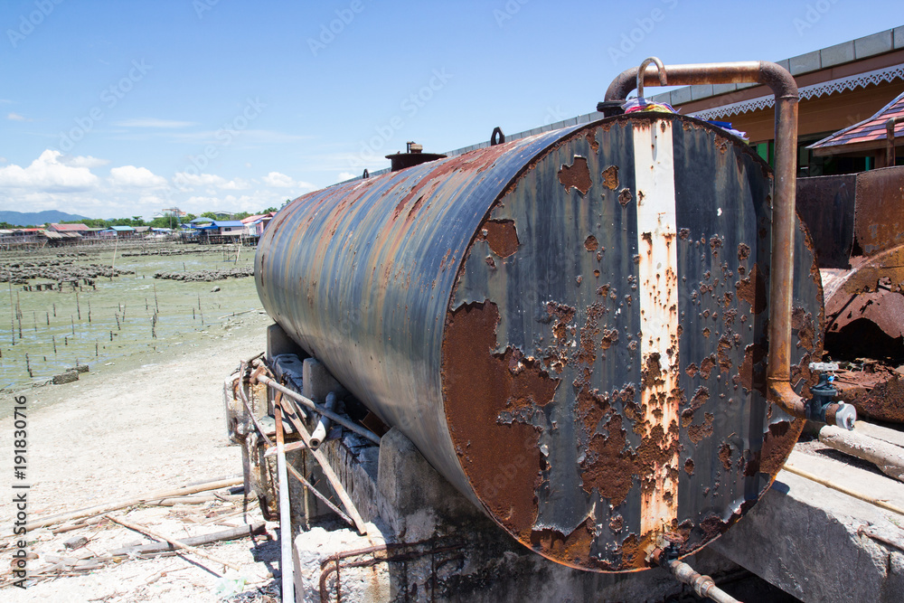 corrosion of steel storage tank near ocean, rusty metal container Stock ...
