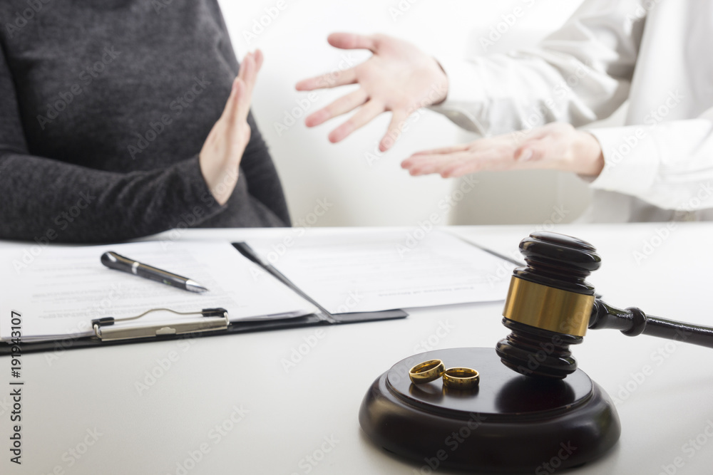 Hands of wife, husband signing decree of divorce, dissolution ...