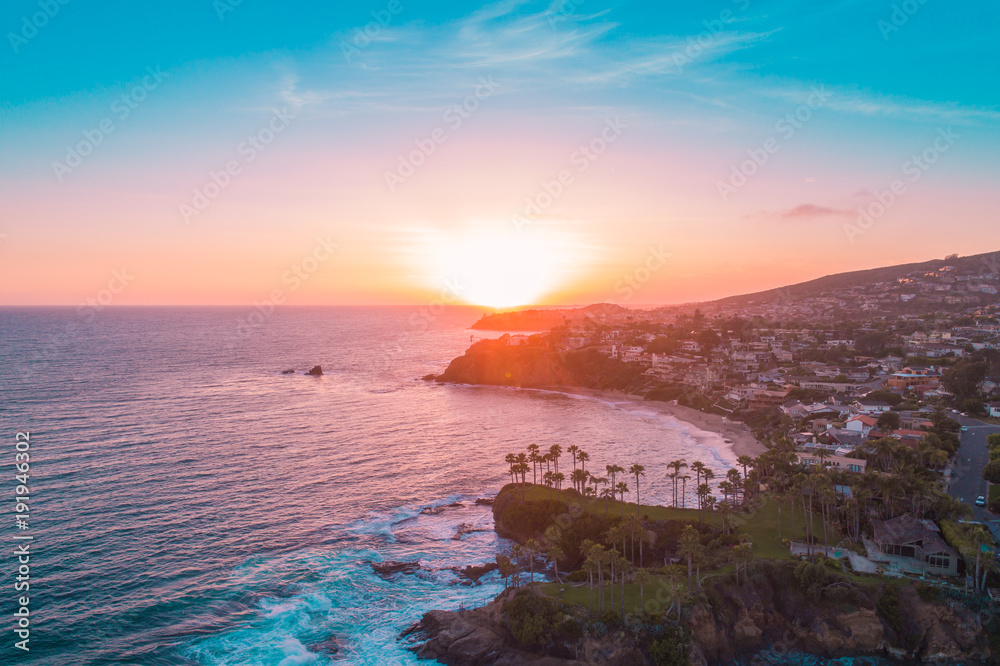 Aerial view over Crescent Bay in Laguna Beach at sunset overlooking ...
