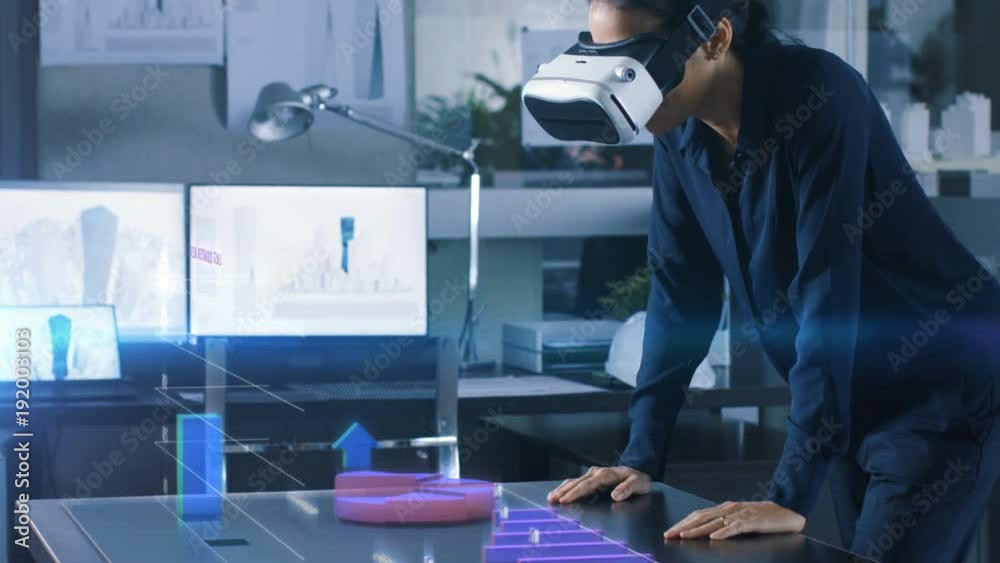 In the Office Professional Woman Wearing Augmented Reality Headset ...