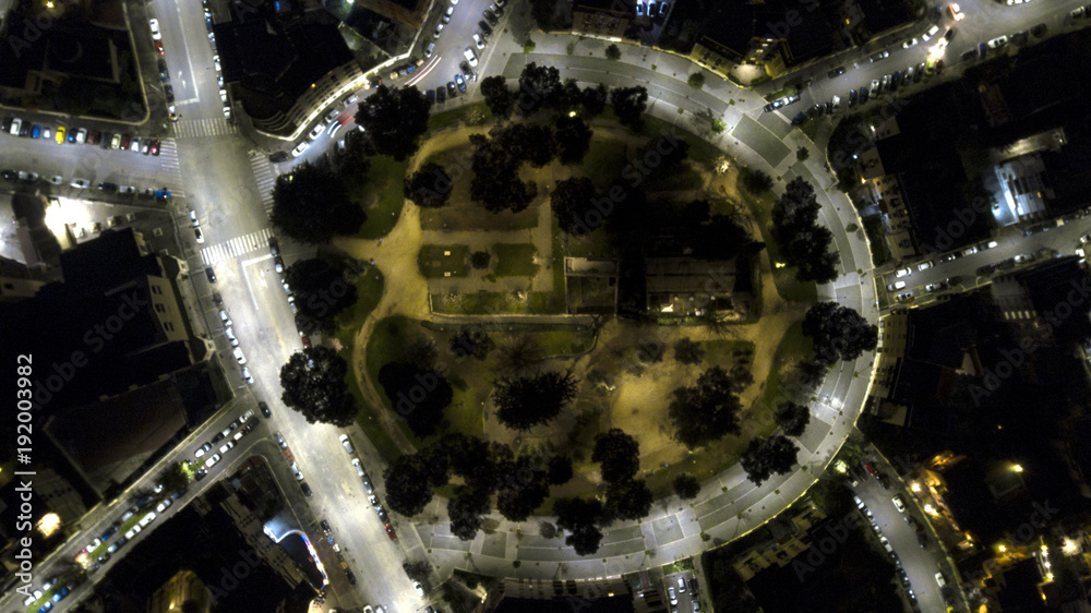 Perpendicular night view of Piazza di Villa Fiorelli in Rome, Italy ...