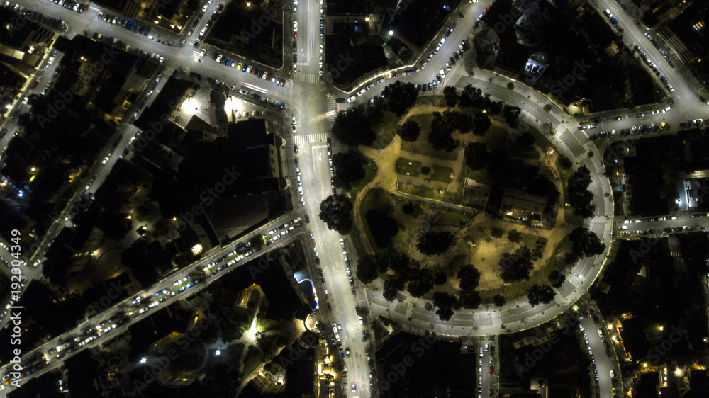 Perpendicular night view of Piazza di Villa Fiorelli in Rome, Italy ...
