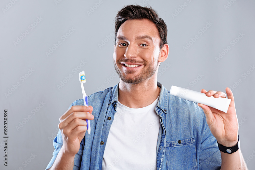 Handsome bearded man with healthy teeth isolated on a white background ...
