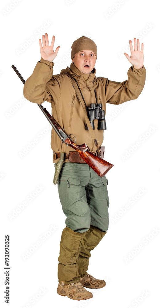 Full length portrait of a male hunter with double barreled shotgun ...