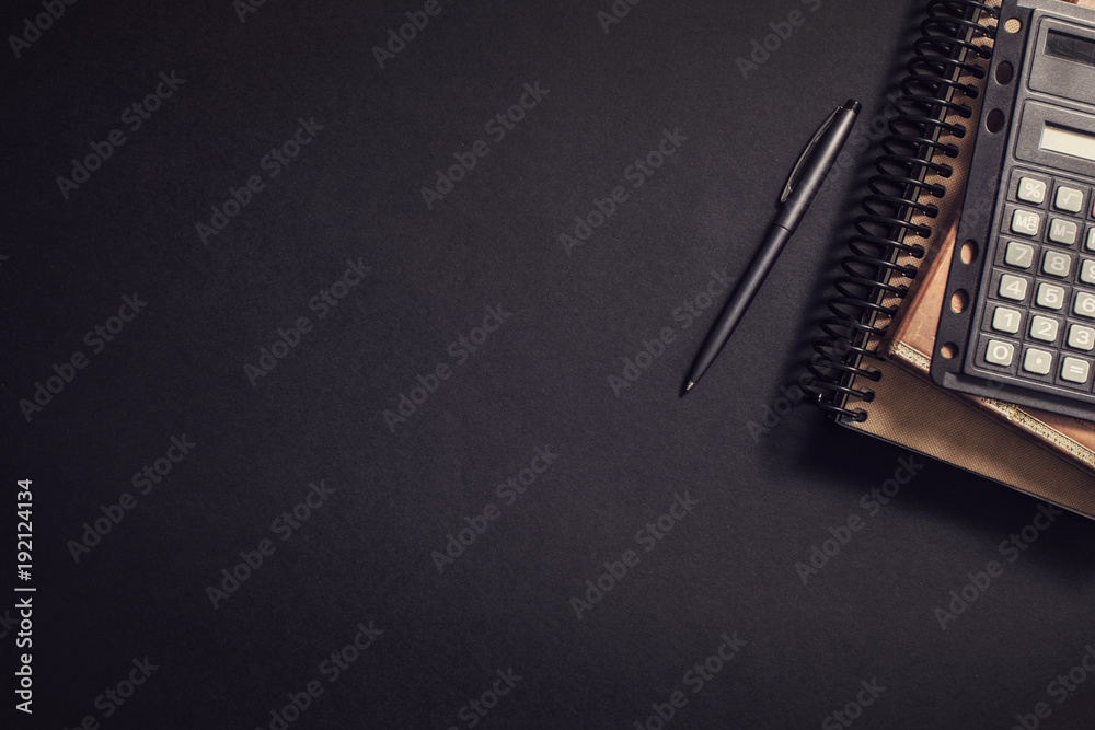 Working table on black background Stock Photo | Adobe Stock