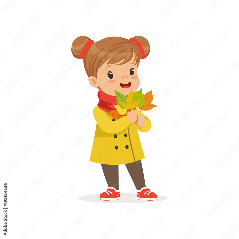 Sweet little girl in warm clothing holding autumn leaves, cute kid ...