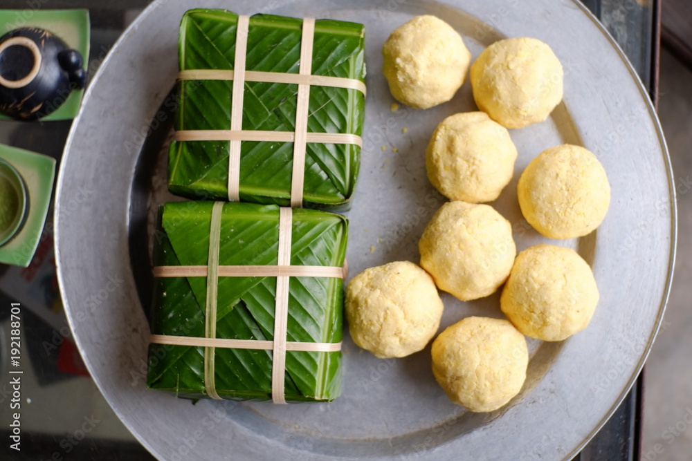 Packing Banh Chung (sticky rice cake), this is a traditional Vietnamese ...