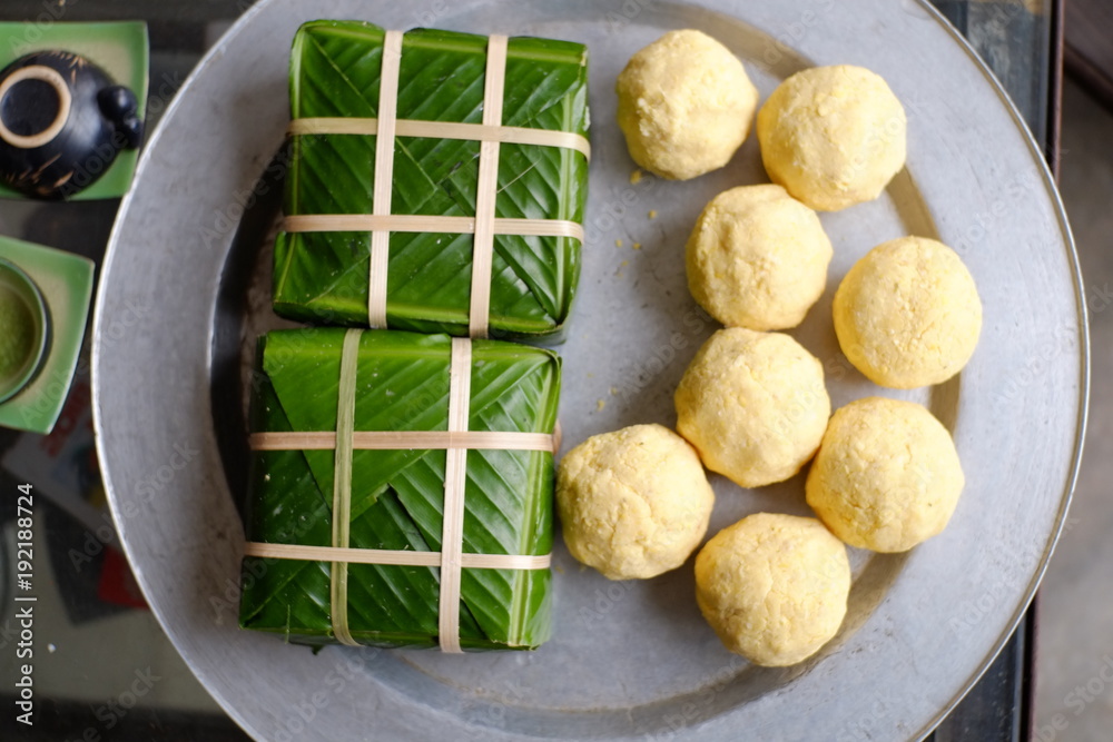Packing Banh Chung (sticky rice cake), this is a traditional Vietnamese ...