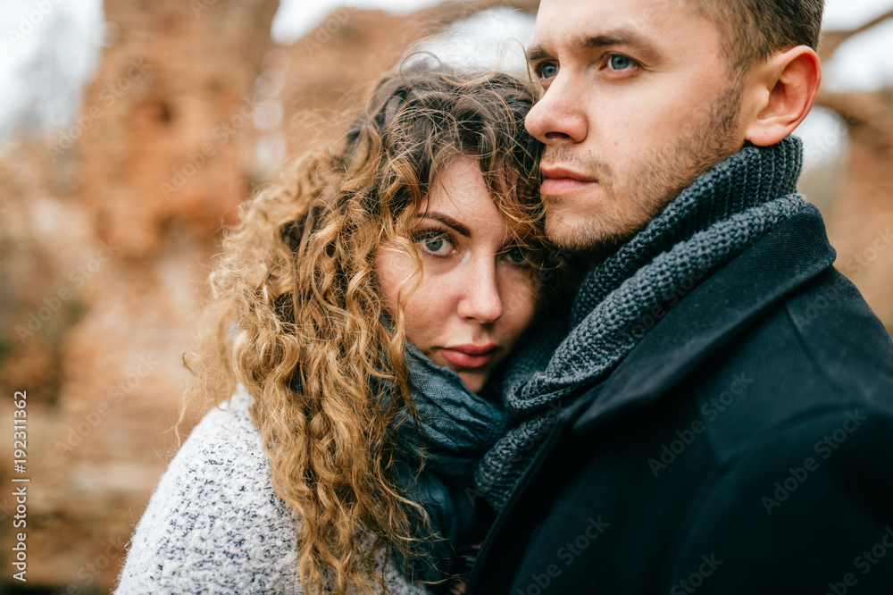 Closeup portrait of loving pair. Two lovers outdoor standing cheek to ...