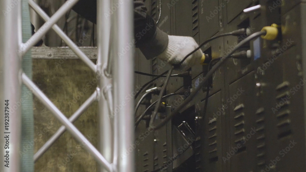 Foto de Electrician engineer tests electrical installations and wires ...