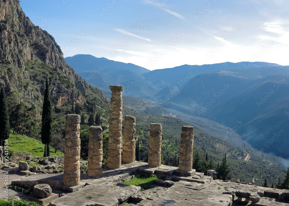 Ruins of the ancient Temple of Apollo at Delphi, overlooking the valley ...