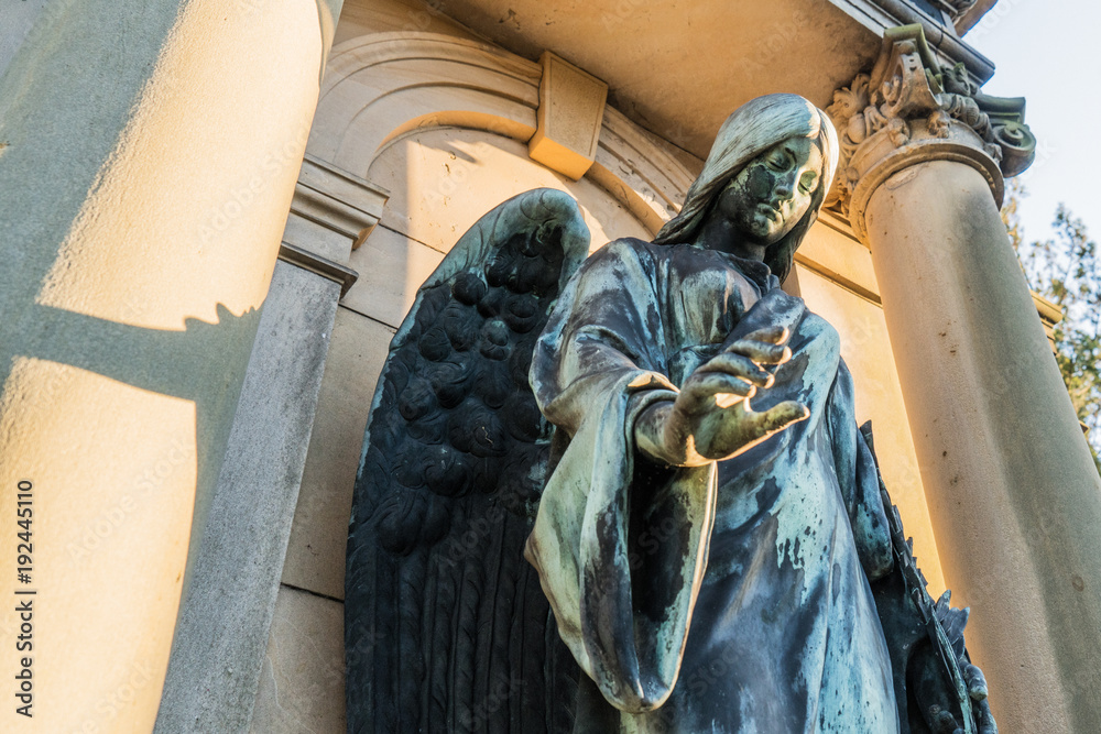 Angel Statue between Pillars is Protecting, Guarding and Comforting on ...