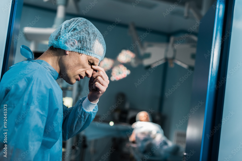 Exhausted Doctor After Surgery