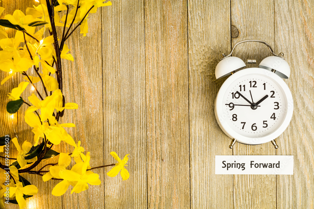 Daylight Savings Time Spring Forward concept top down view with white ...