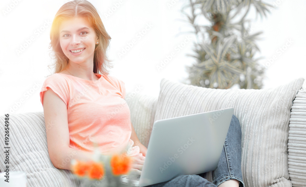 portrait of a young woman with a laptop.the background image Stock ...