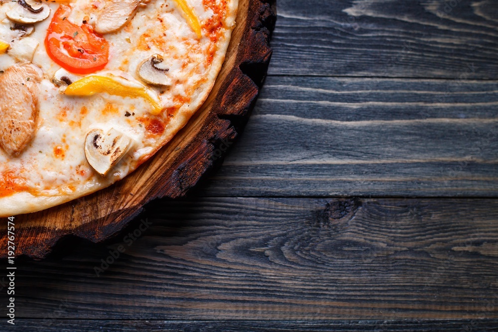 Appetizing pizza with tomato, chicken, paprika and mushrooms, top view ...