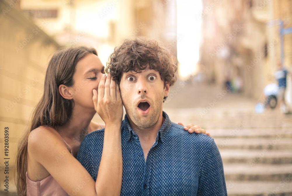 Whispering shocking secrets Stock Photo | Adobe Stock