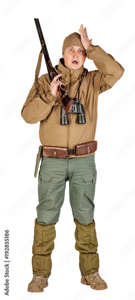 Foto de Full length portrait of a male hunter with double barreled ...